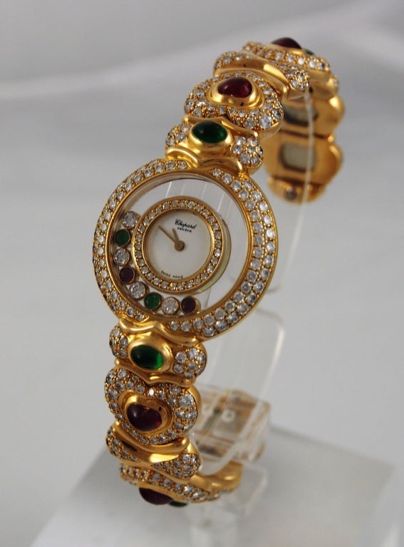 CHOPARD Yellow Gold, Diamond, Ruby Happy Diamonds Bangle Watch at 1stDibs
