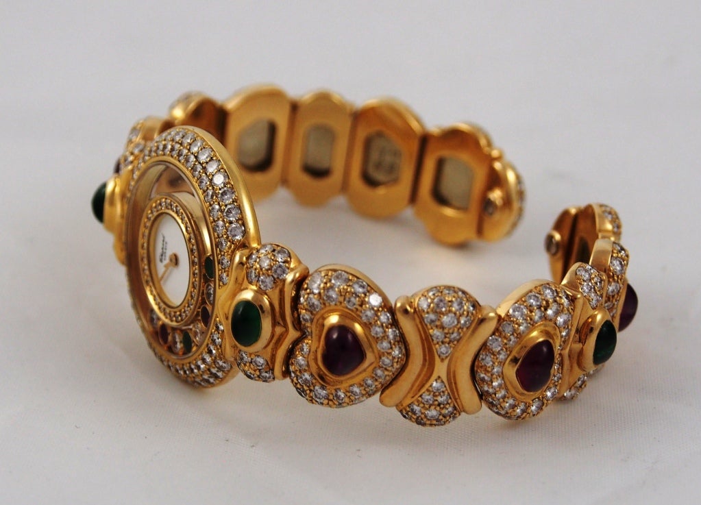 CHOPARD Yellow Gold, Diamond, Ruby Happy Diamonds Bangle Watch at 1stDibs