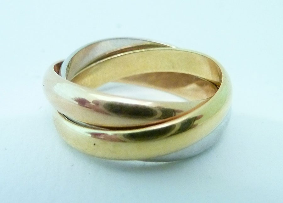 Famous Vintage Cartier Triple Roll Ring For Sale at 1stDibs
