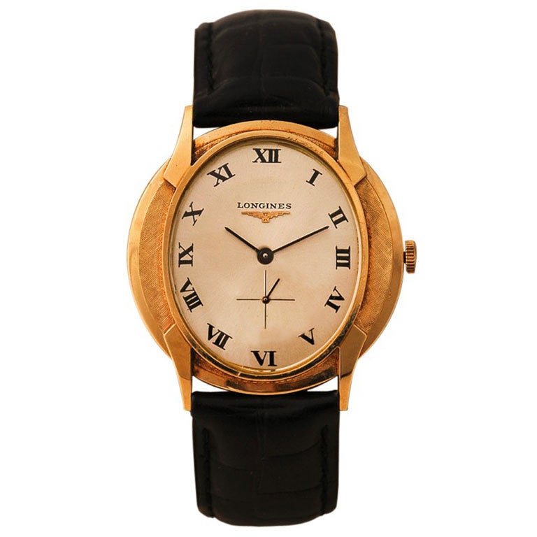 LONGINES Yellow Gold Wristwatch with Oval Dial For Sale at 1stDibs