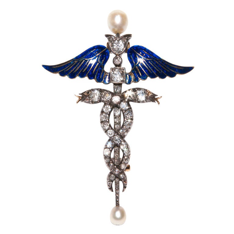 A Victorian Enamel Diamond Gold Caduceus Brooch at 1stDibs