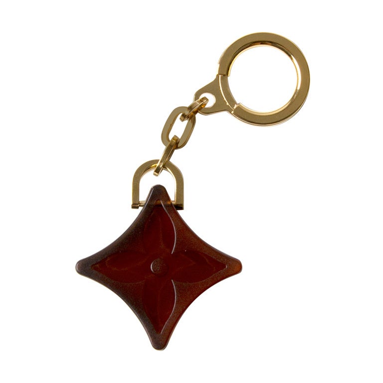 Archival Louis Vuitton Quatrefoil Flower KeyChain at 1stDibs | louis ...