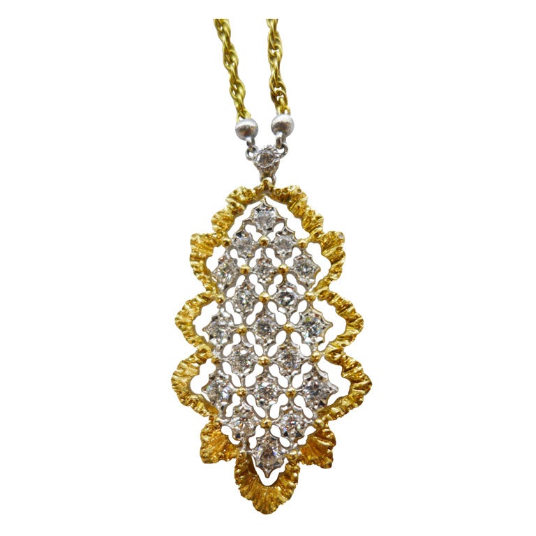 Two colors of gold Buccellati pendant set with diamonds on its twisted ...