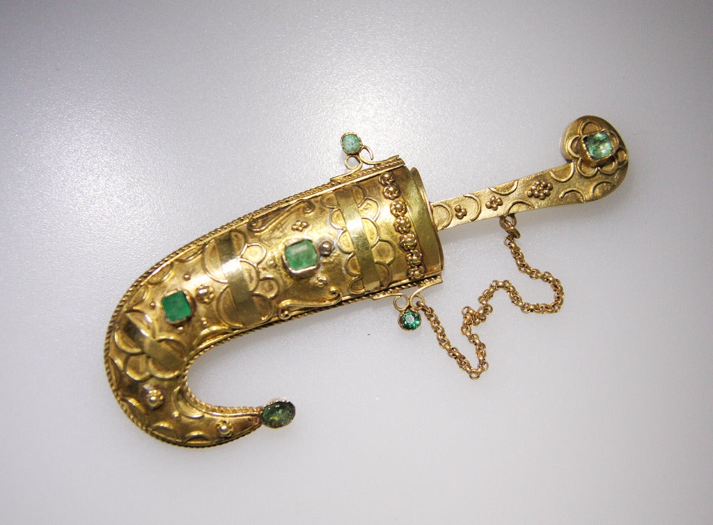 Decorative Green Crystal Emerald Gold Sword Brooch For Sale at 1stDibs