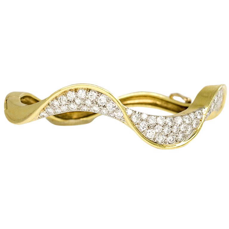 A Gold and Diamond Undulating Bangle at 1stDibs