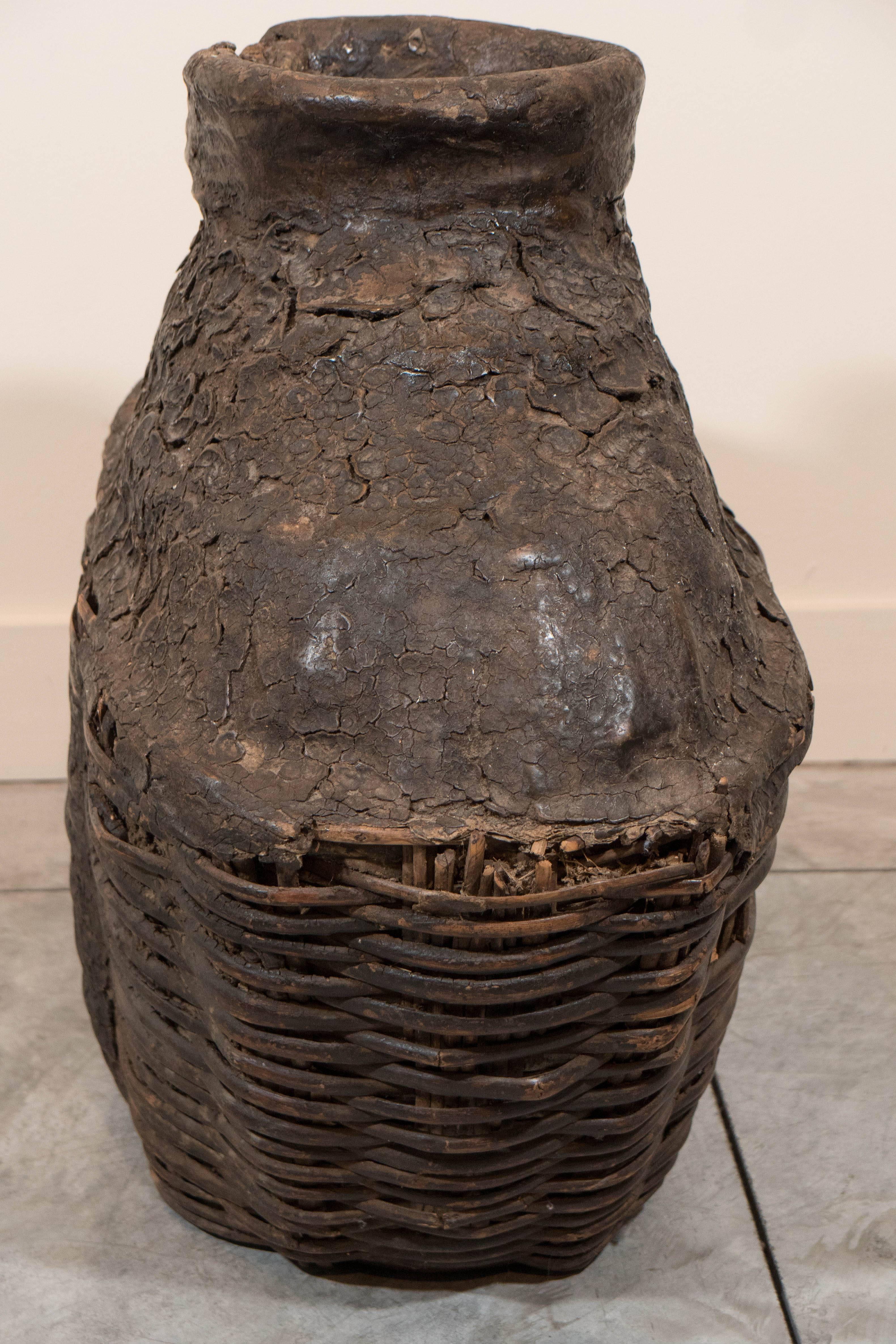 Large Antique Woven Oil Container at 1stDibs