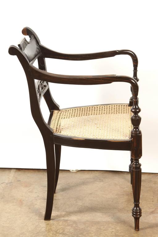 British Colonial Ebony Armchair at 1stDibs