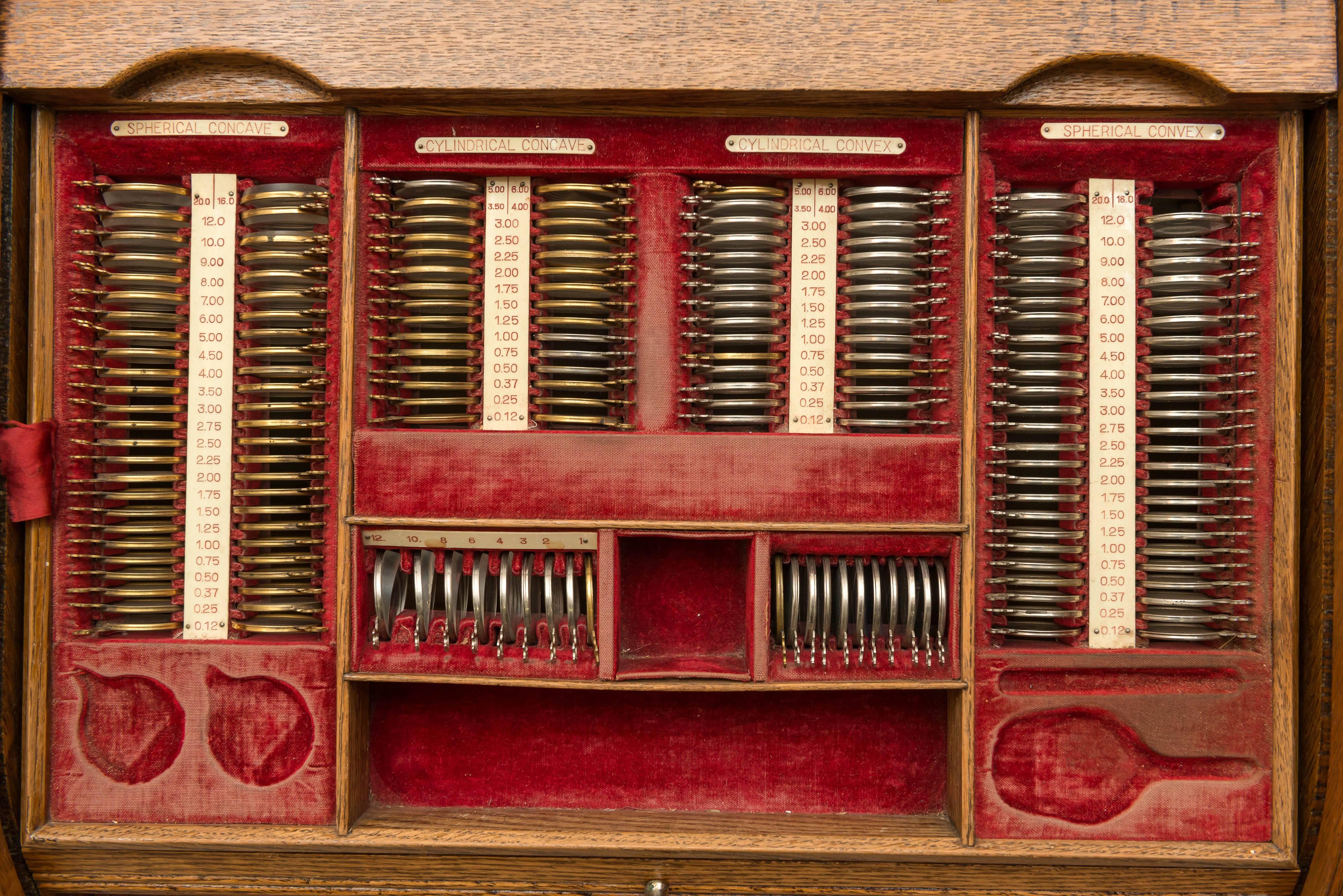 Optometrist Cabinet in an Oak Roll Front Cabinet at 1stDibs