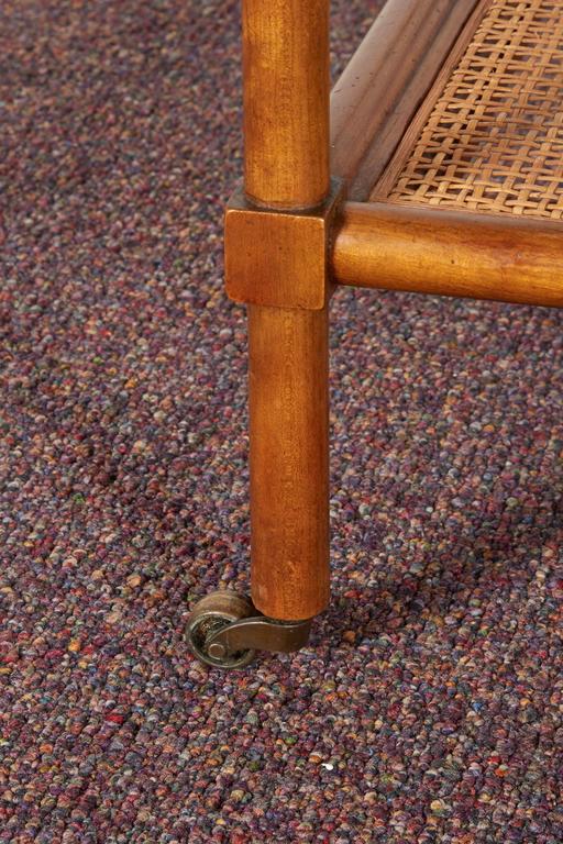 Pair of Baker Rolling Tables with Cane Shelf at 1stDibs