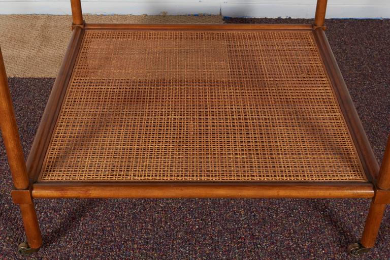 Pair of Baker Rolling Tables with Cane Shelf at 1stDibs