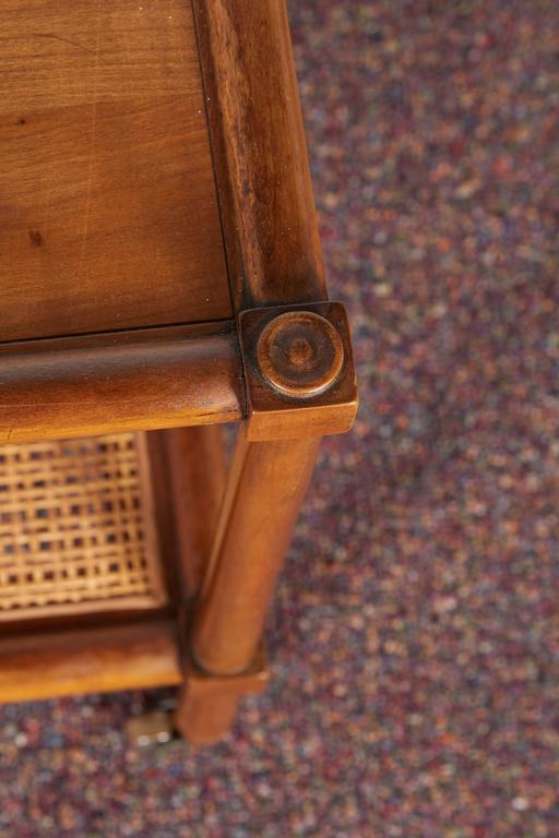 Pair of Baker Rolling Tables with Cane Shelf at 1stDibs