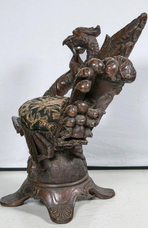 19th Century Carved Black Forest Chair with an Eagle at 1stDibs