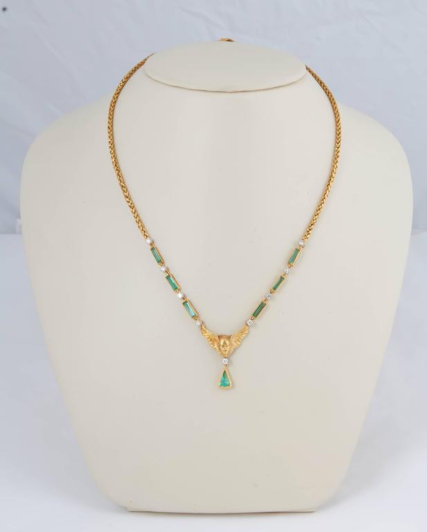 Gold Cherub with Wings Emerald and Diamond Necklace For Sale at 1stDibs