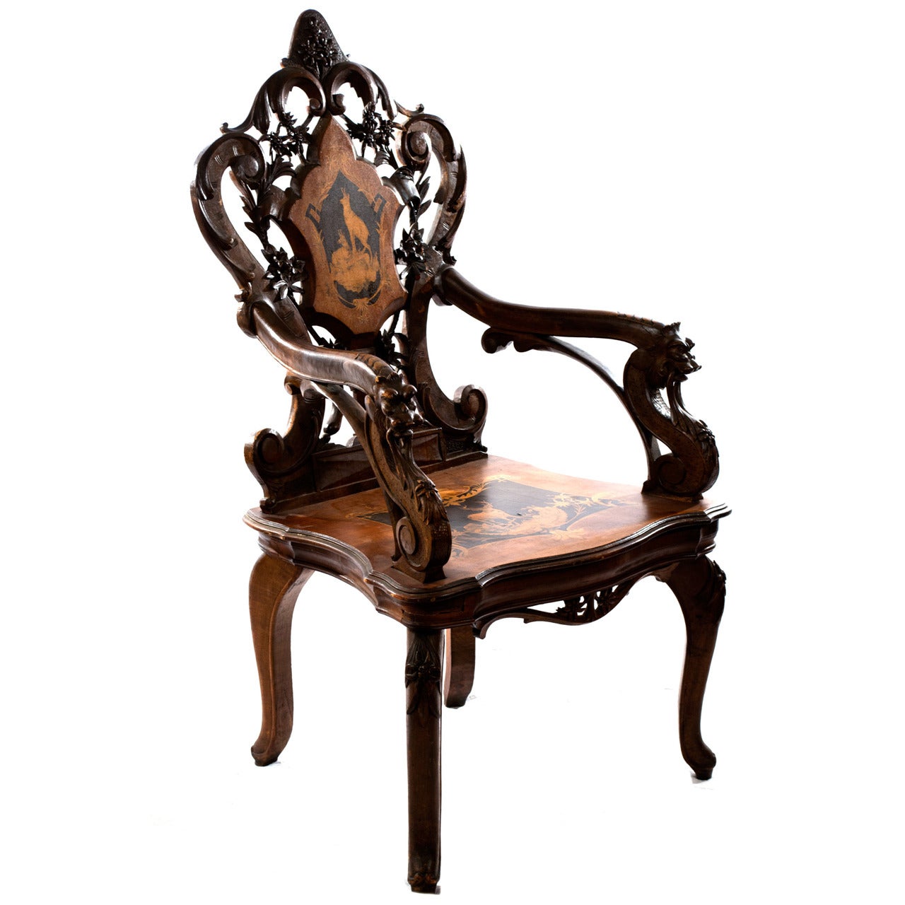 Elaborately Carved Black Forest Armchair with Hidden Compartment at 1stDibs