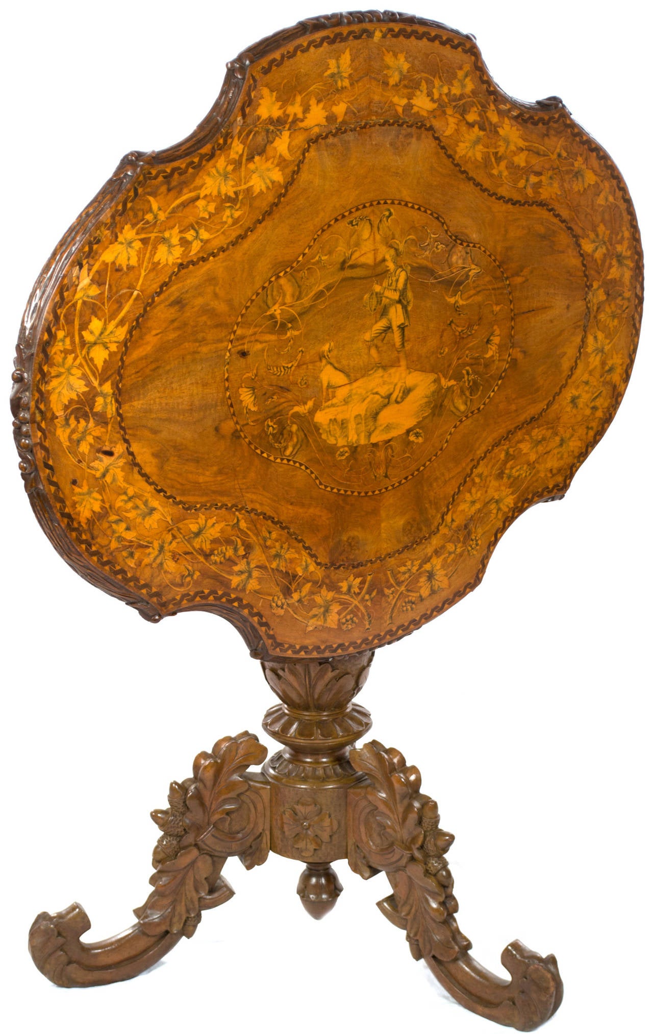 Carved Black Forest Occasional Table with Marquetry Top at 1stDibs