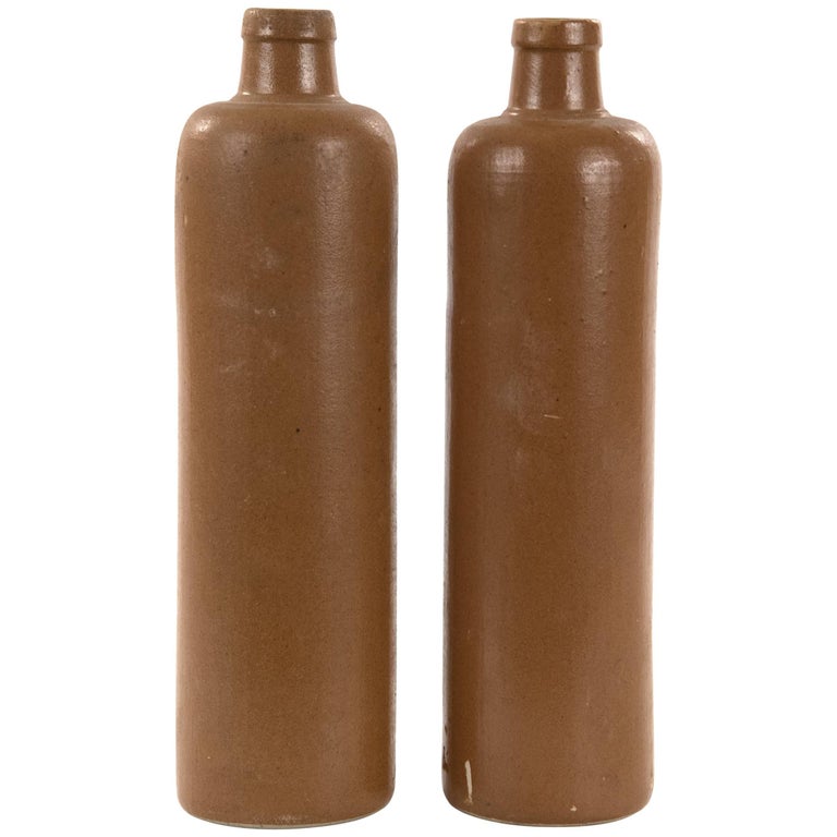 Pair of Elongated Brown Glazed Stoneware Bottles For Sale at 1stDibs