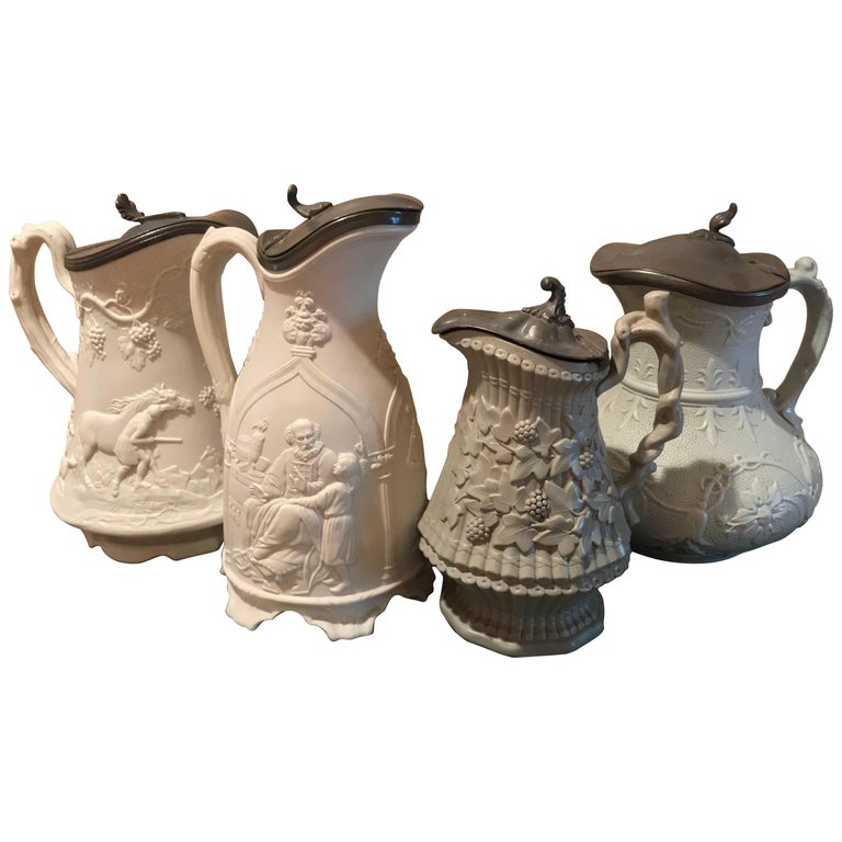 Lot of Four Pewter Top Relief Pitchers at 1stDibs