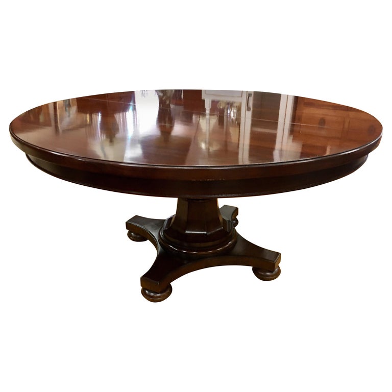 Round Mahogany Dining Room Table with Expandable Leaf at 1stDibs