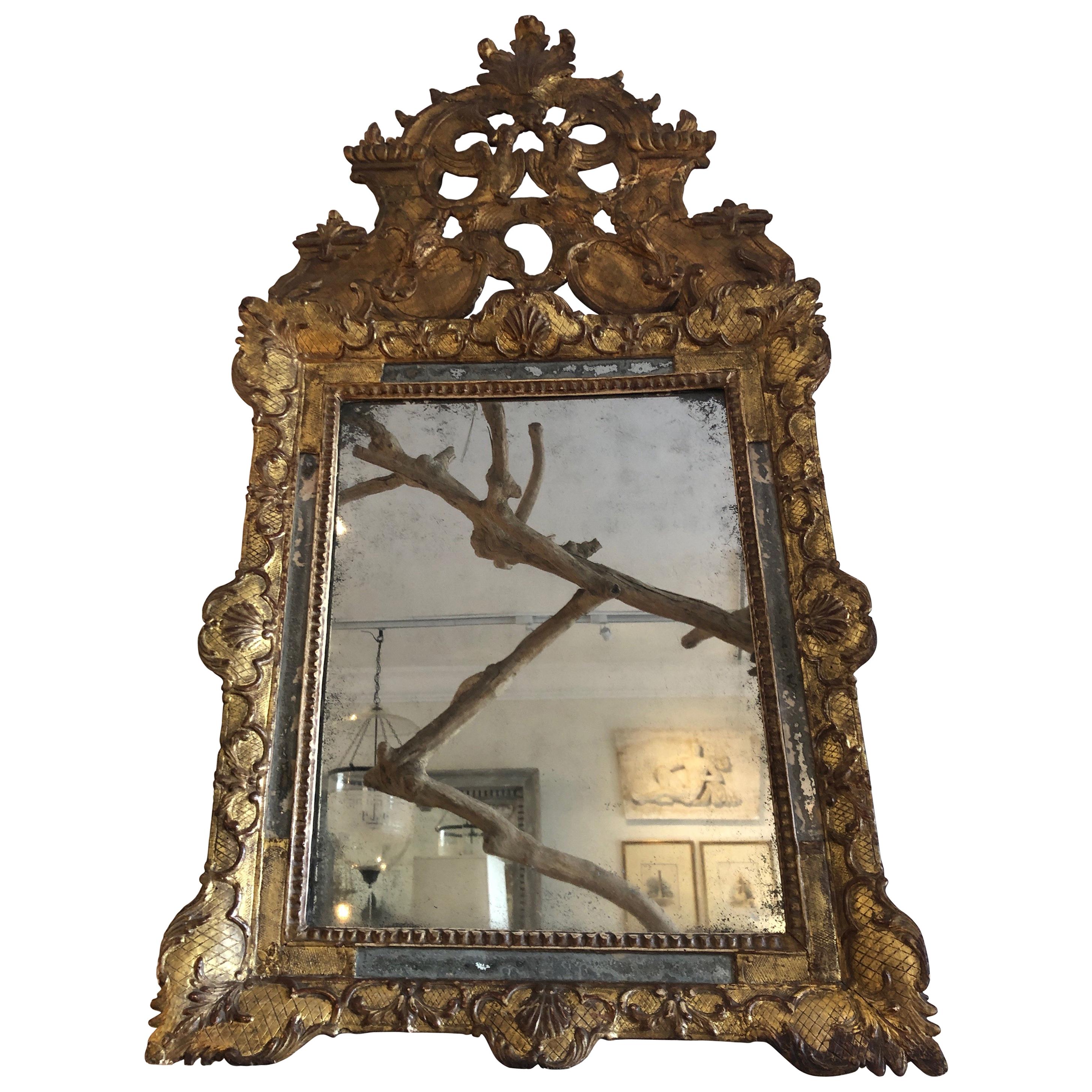 Gilded Antique Rococo Mirror with Detachable Figure at 1stDibs