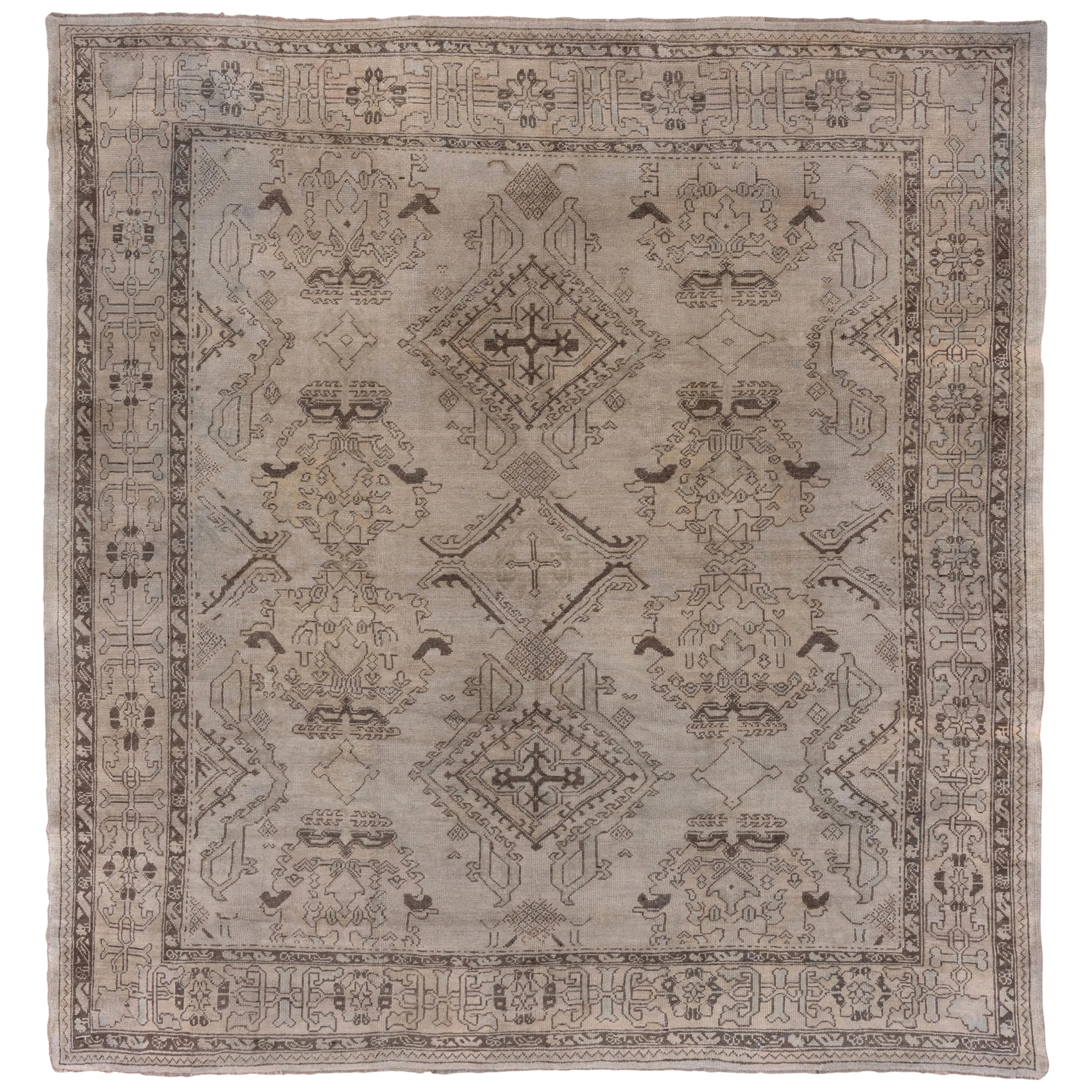 Subdued Antique Oushak Carpet, circa 1910s For Sale at 1stDibs