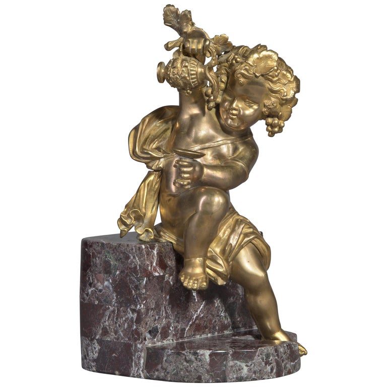 Gilt Bronze Bacchanalian Putto Figure on a Rouge Marble Plinth, circa ...