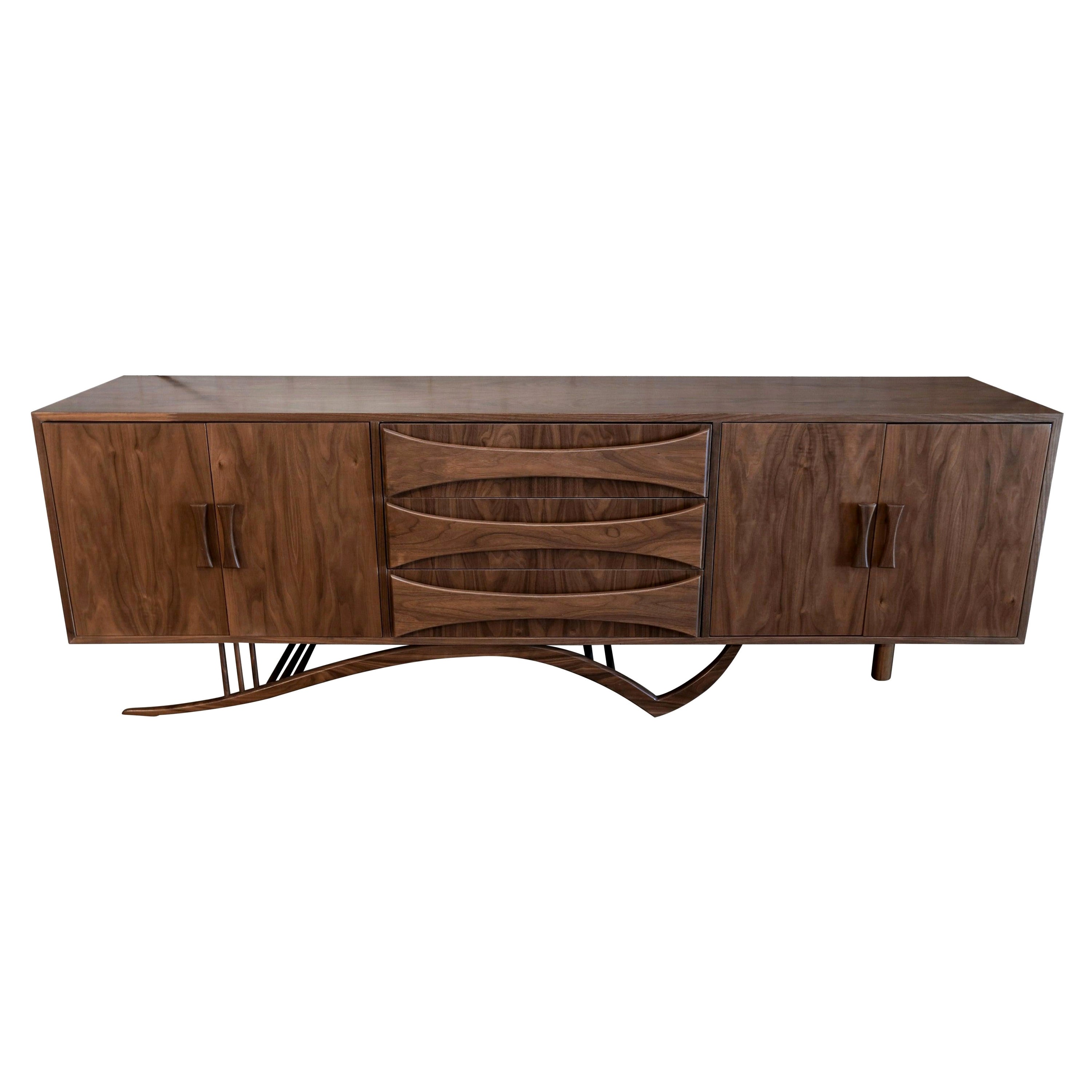 Teak Mid Century Sideboard with curved shaped legs at 1stDibs