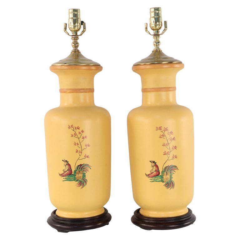 Pair of Chinese Yellow Balancing Scene Table Lamps For Sale at 1stDibs
