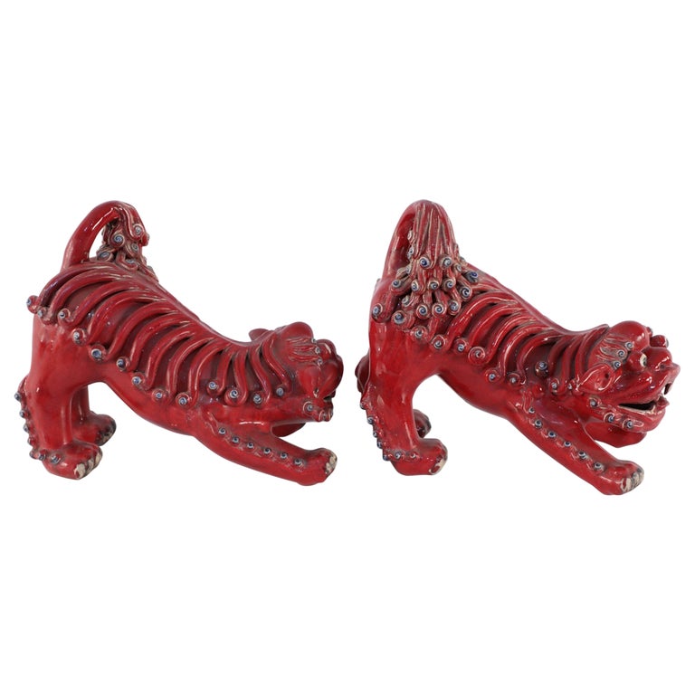 Pair of Chinese Shiwan Guangdong Red Porcelain Foo Dogs For Sale at 1stDibs