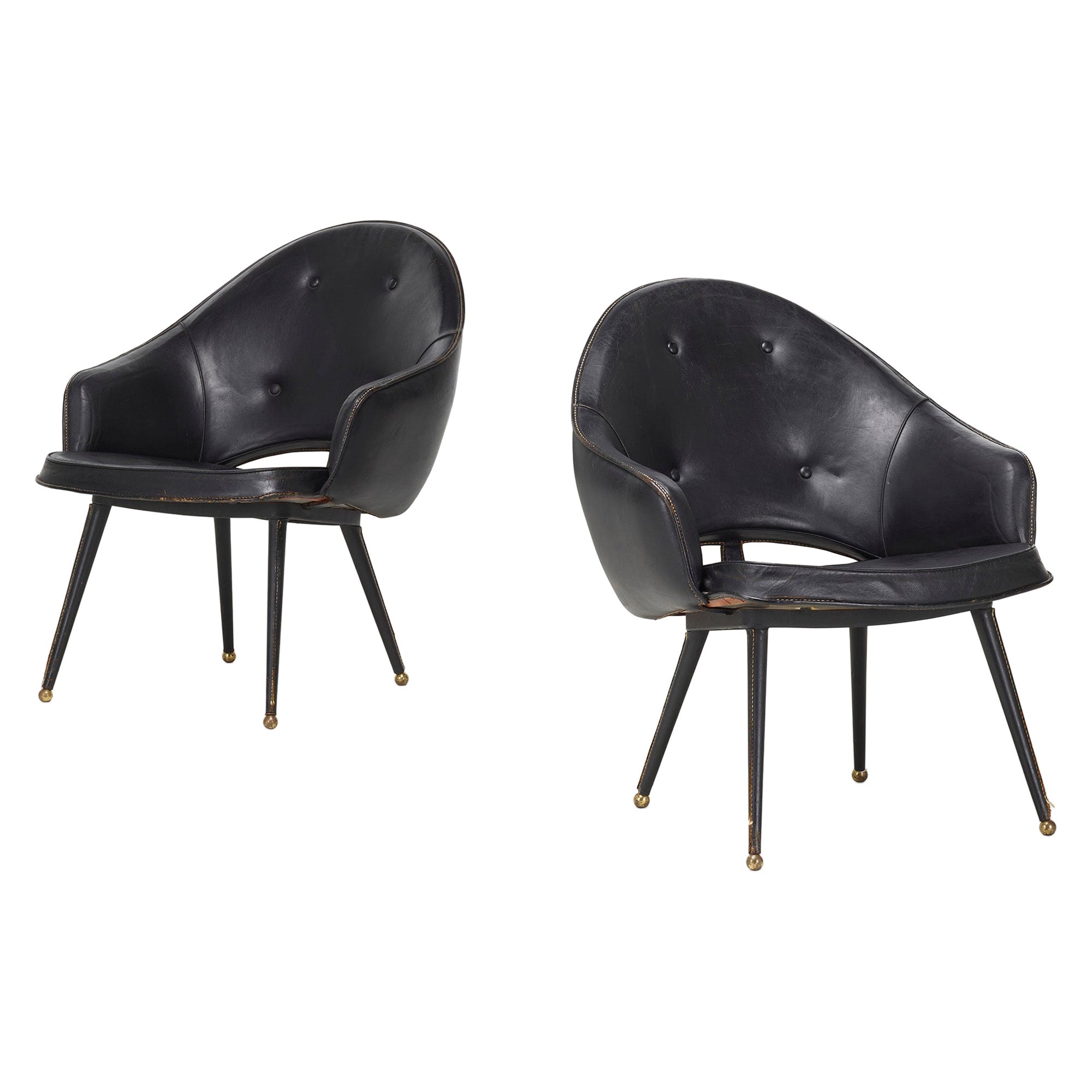 Jacques Adnet, Pair of leather lounge chairs at 1stDibs