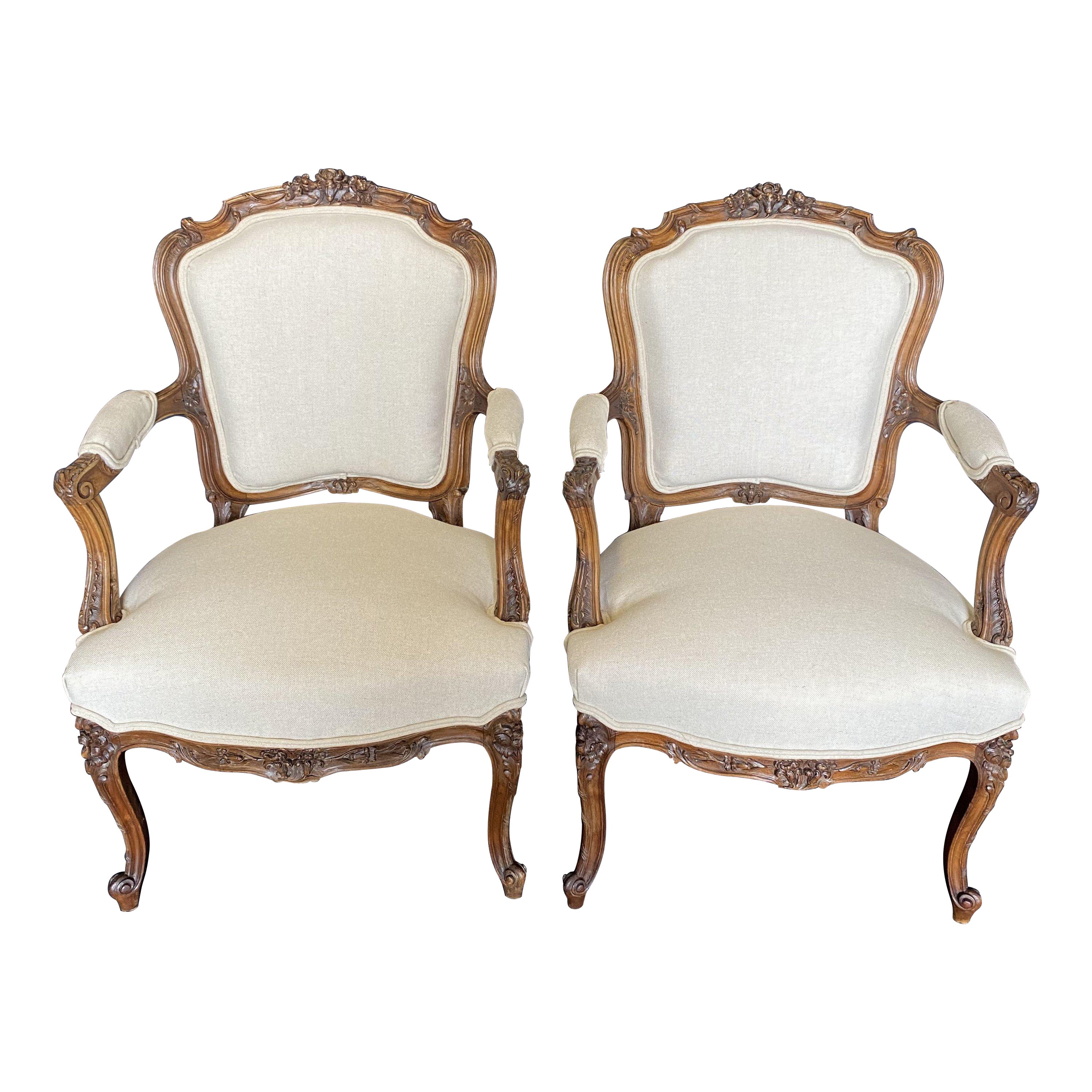 French Antique Pair Of Intricately Carved Louis Xv Walnut Arm Chairs