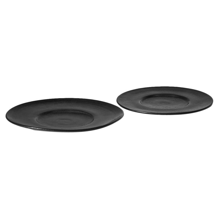 Pair of Large Black glazed Ceramic platters, France 1960s at 1stDibs