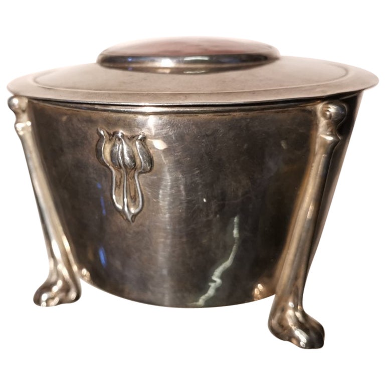 Edith Dawson. An Arts and Crafts Silver Pot with Floral Details and A ...