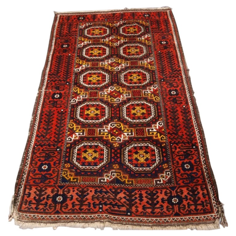 Antique Salar Khani Baluch Rug with Turreted Gul Design For Sale at 1stDibs