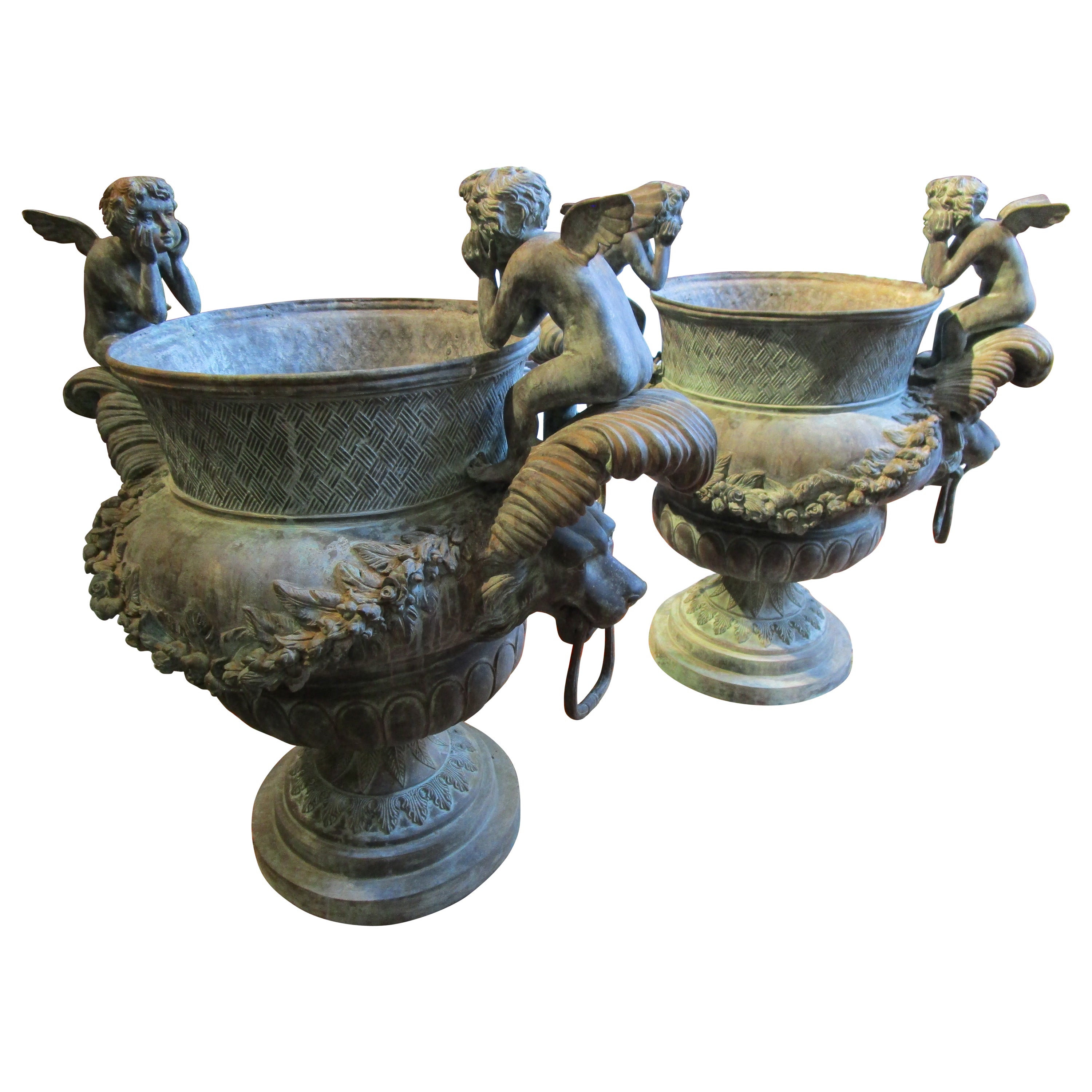 Set of Four Cement Urns with Ram Heads at 1stDibs