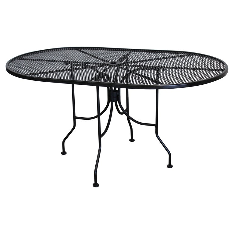 Mid-Century Woodard Oval Iron Outdoor Dining Table at 1stDibs