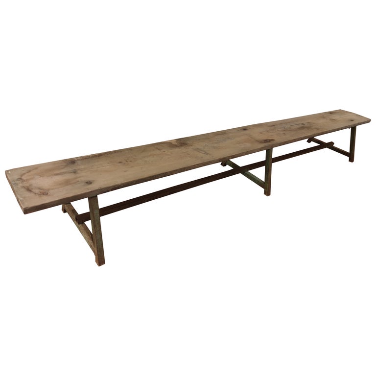 Elongated Low Wooden Bench with Iron Feet For Sale at 1stDibs
