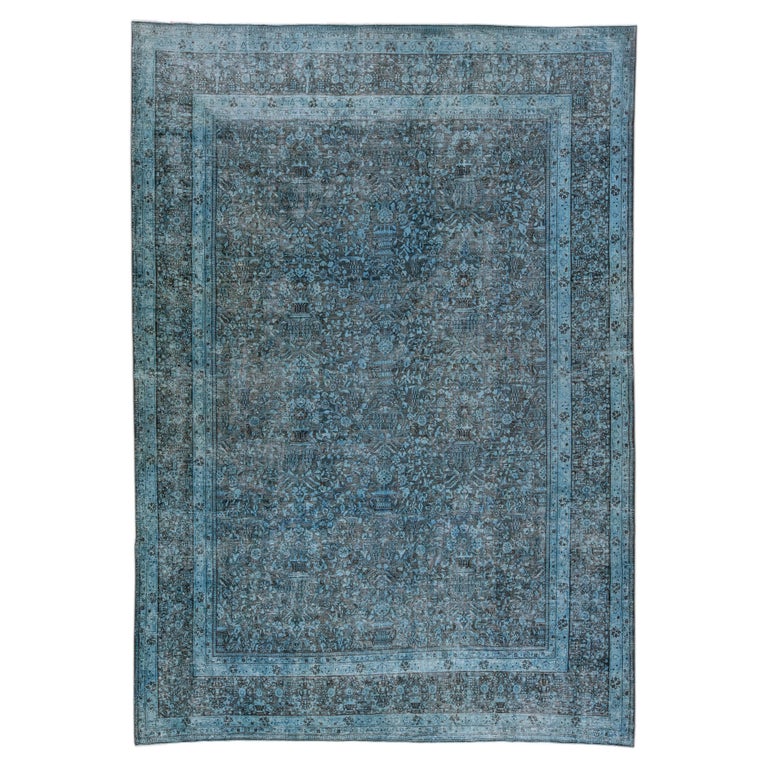 Vintage Persian Overdyed Handmade Floral Blue Wool Rug For Sale at 1stDibs