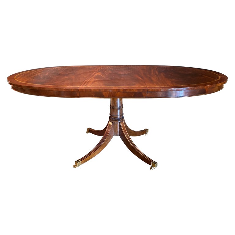 Oval Banded Mahogany Single Pedestal Dining Table with One Leaf at 1stDibs