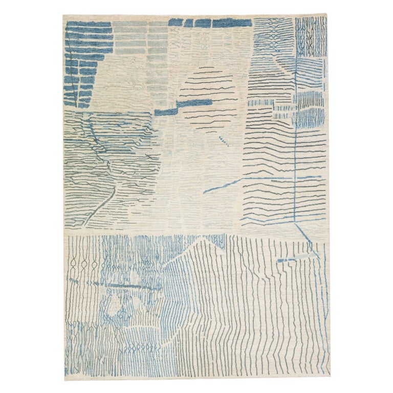 Contemporary Abstract Handmade Ivory and Blue Wool Rug For Sale at 1stDibs