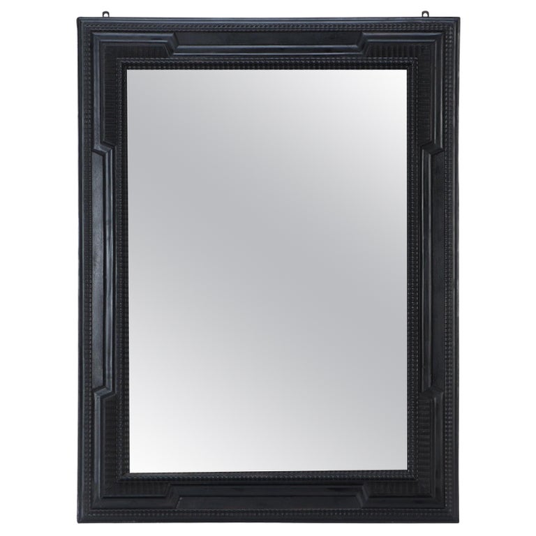 A Large Dutch style ebonIzed frame with ripple carving. Circa 1940. For Sale at 1stDibs
