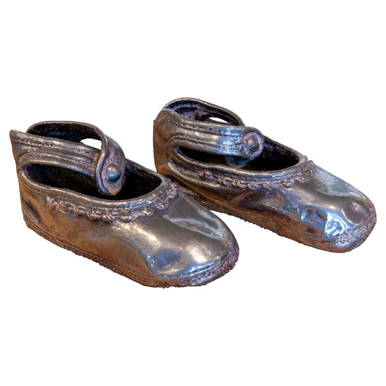 1970s English Pair of Silver Plated Metal Shoes For Sale at 1stDibs