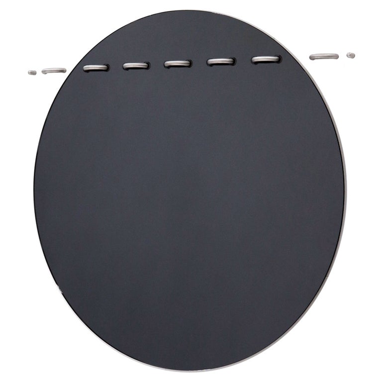 Rauchfarben getöntes rundes verspiegeltes Glas mit polierten Rändern ...