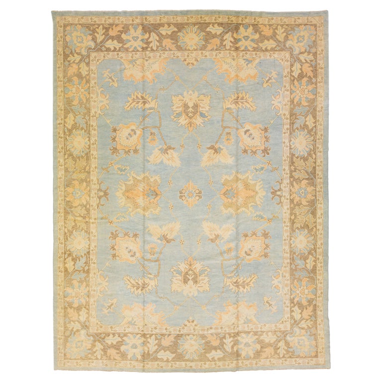 Handmade Modern Turkish Blue Wool Rug with Floral Field For Sale at 1stDibs