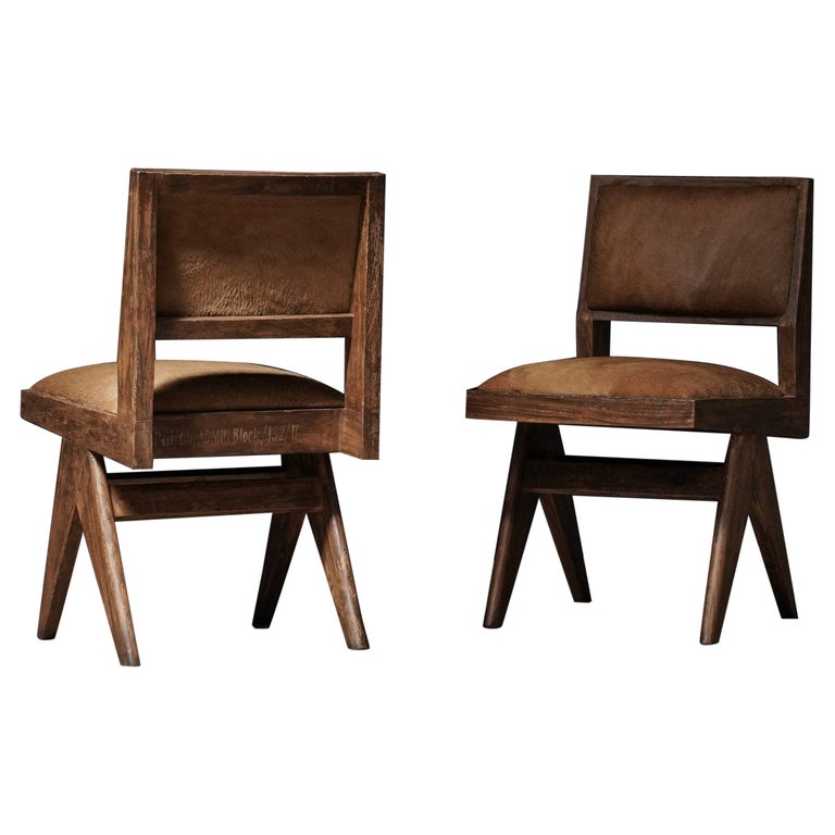 Pair of Pierre Jeanneret Chairs in Cowhide For Sale at 1stDibs