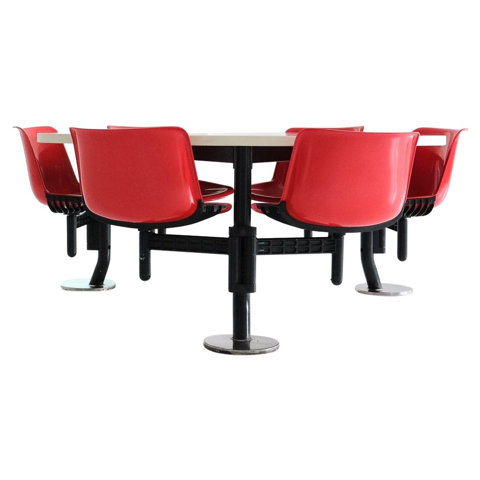 Modus triangular table + integrated swivelling chairs by Osvaldo ...