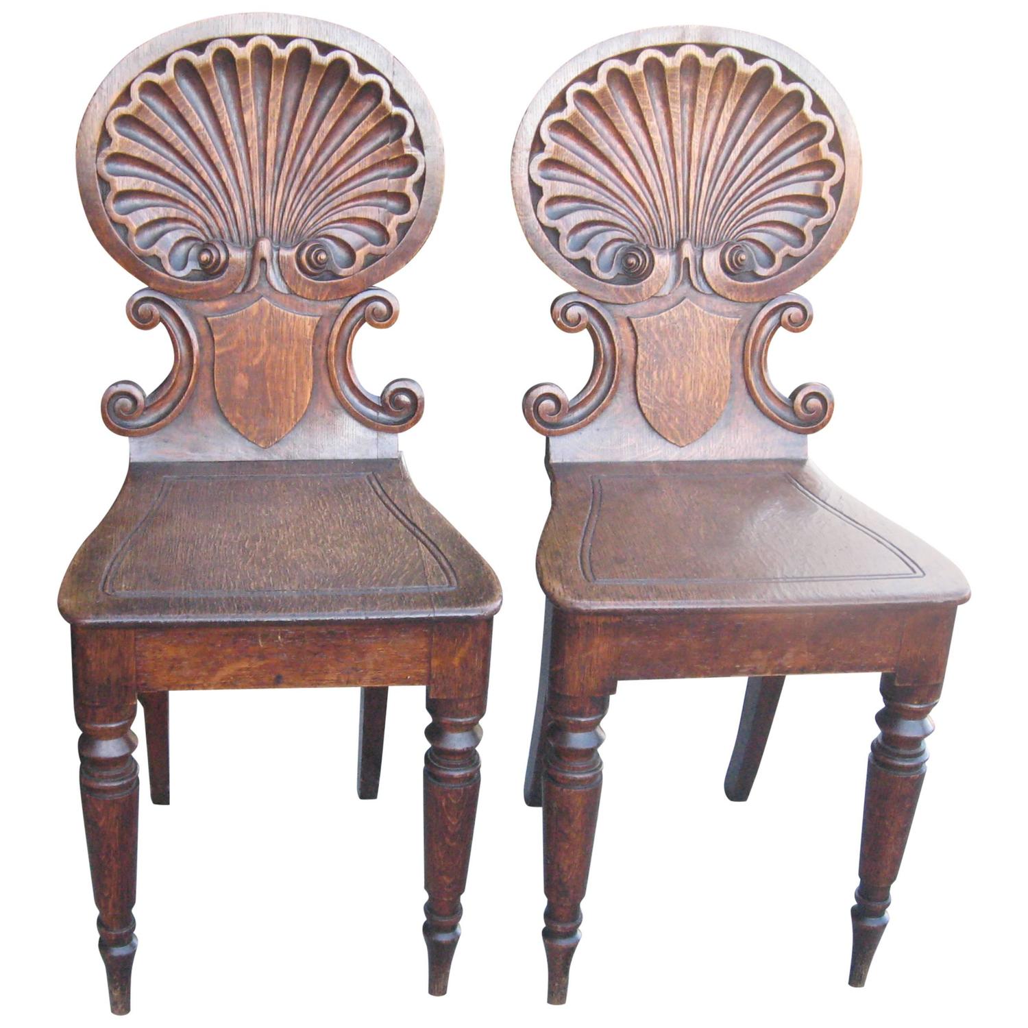 Pair of 19th Century English Oak Shell Back Hall Chairs at 1stdibs