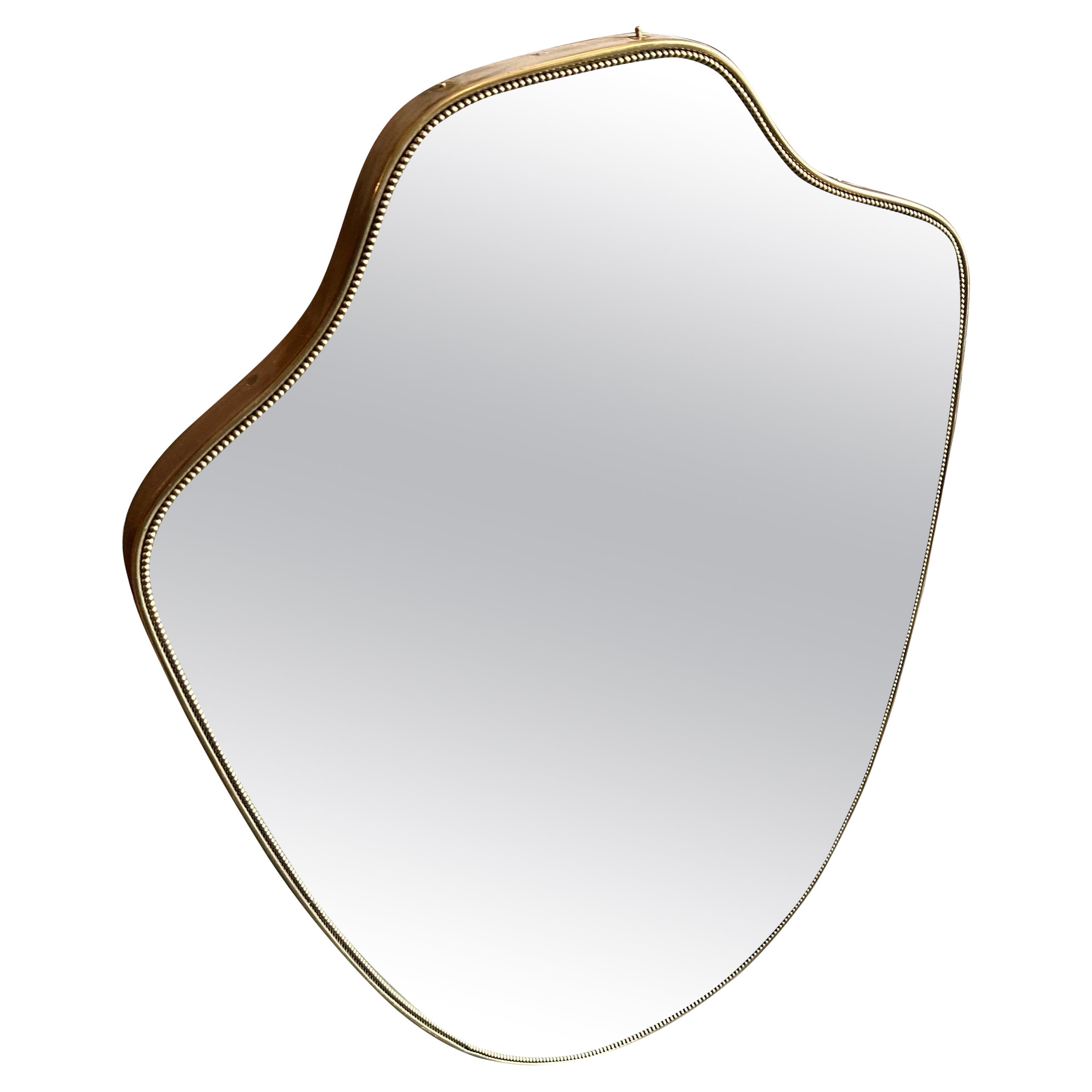 1960s Gio Ponti Style Mid-Century Modern Brass Shield Shaped Wall Mirror For Sale at 1stDibs