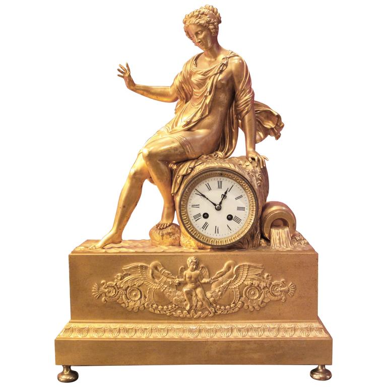 Gilt Empire Clock with Leaning Psyche For Sale at 1stDibs