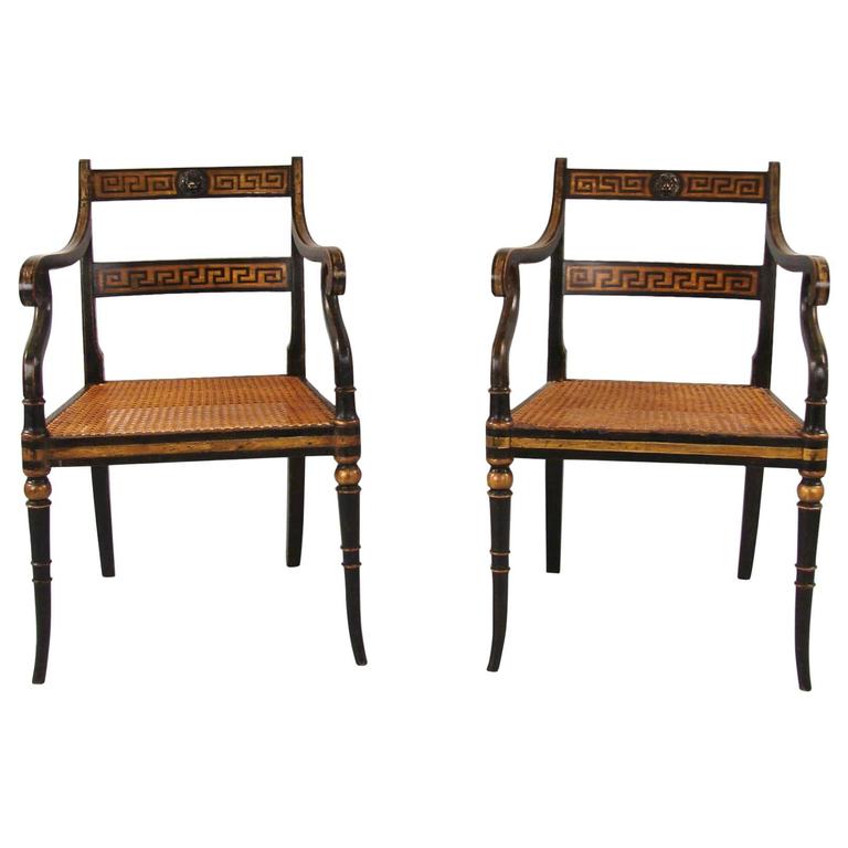 Regency Ebonized Parcel-Gilt Armchairs at 1stDibs
