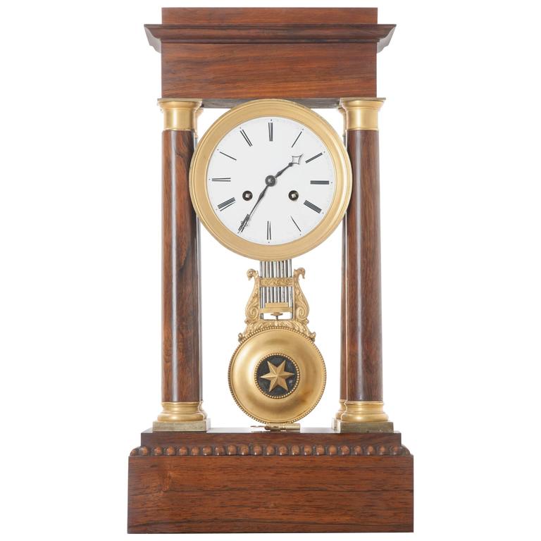 French 19th Century Empire Mahogany Table Clock at 1stDibs